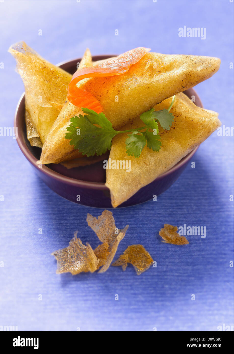 Smoked salmon coriander crisp filo pastry pies hi-res stock photography ...