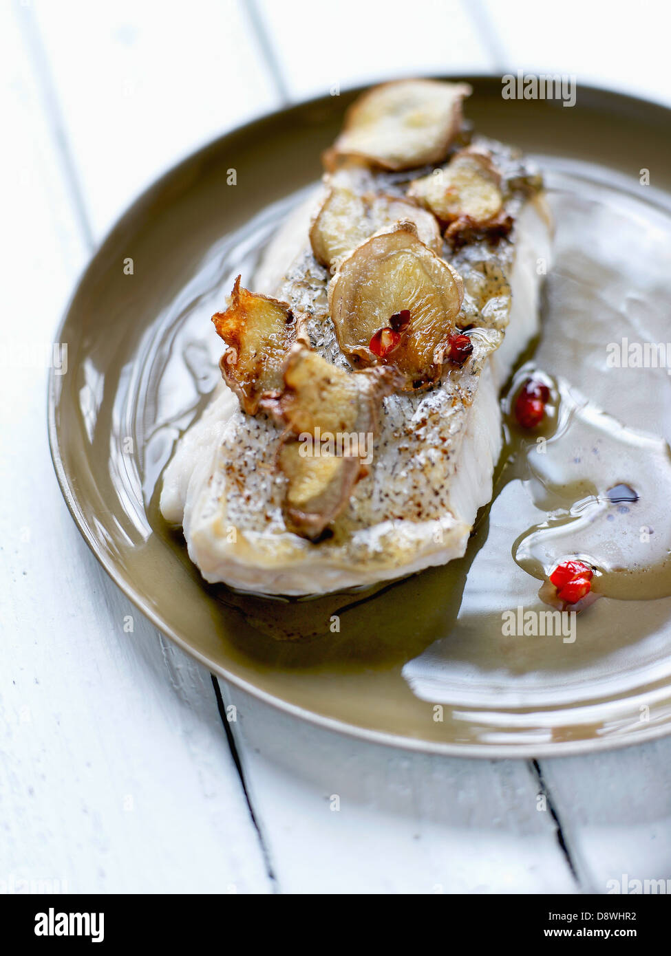 Pollack marinated in sesame oil and ginger Stock Photo - Alamy