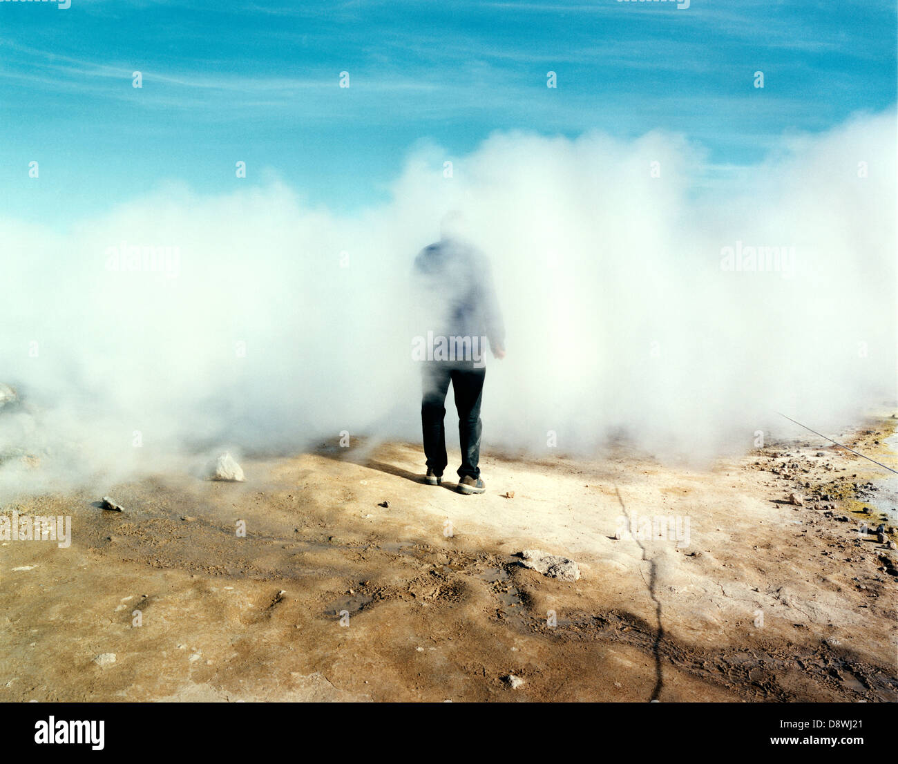 A Man Walking in Fog Stock Photo - Alamy