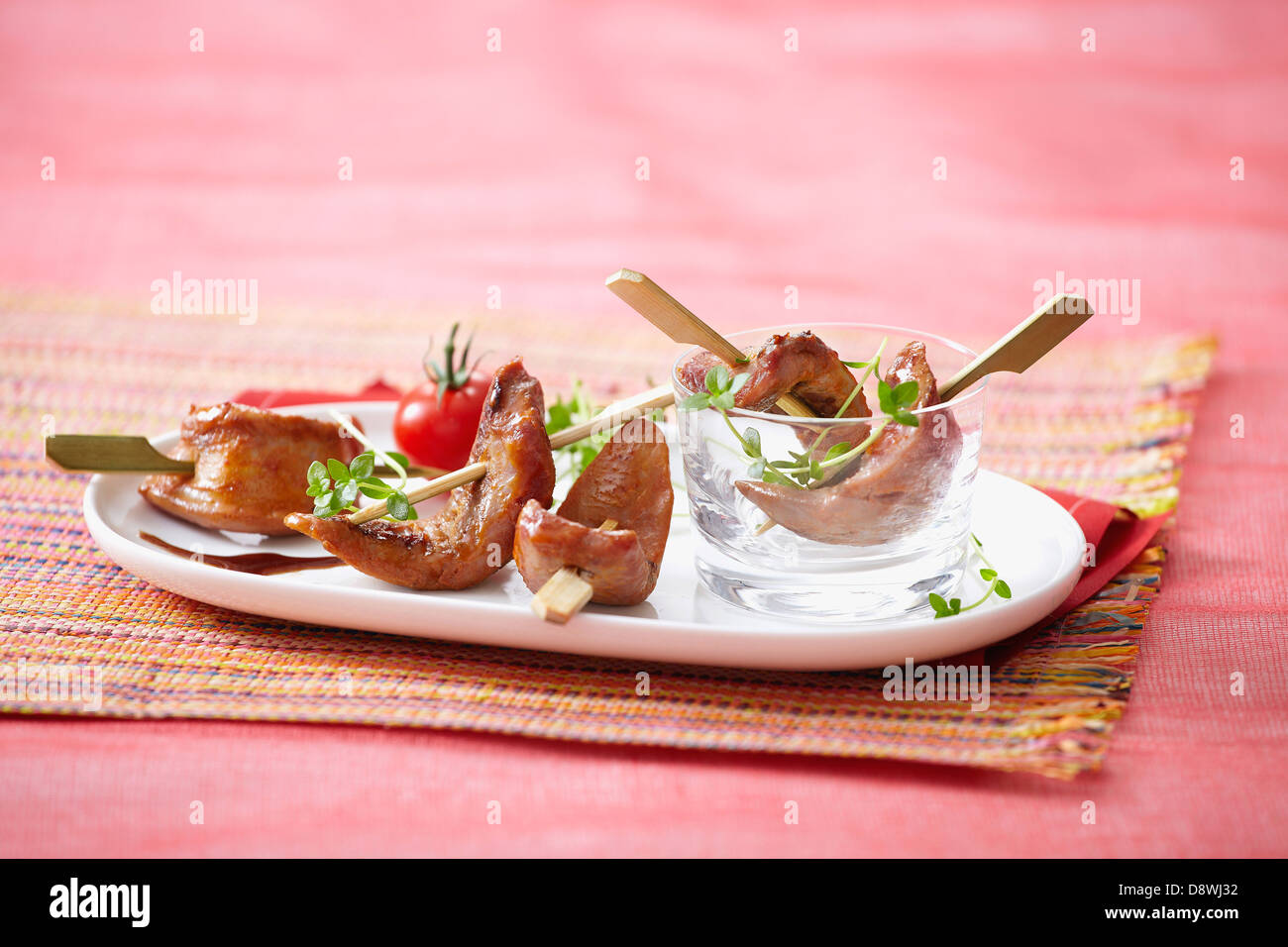 Catalan-style duck mini brochettes Stock Photo - Alamy