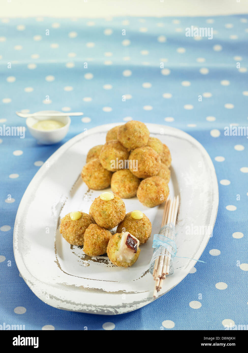 Octopus and potato croquettes Stock Photo - Alamy