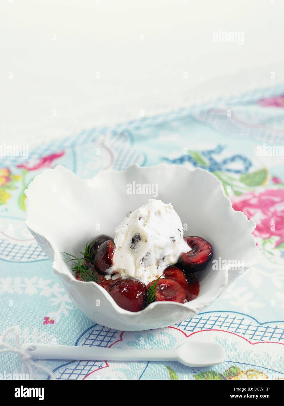 Stewed cherries with vanilla-prune ice cream Stock Photo - Alamy