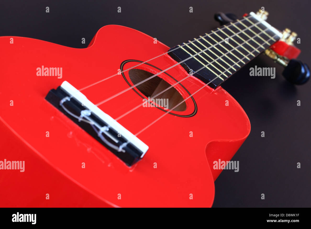 Red ukulele hi-res stock photography and images - Alamy
