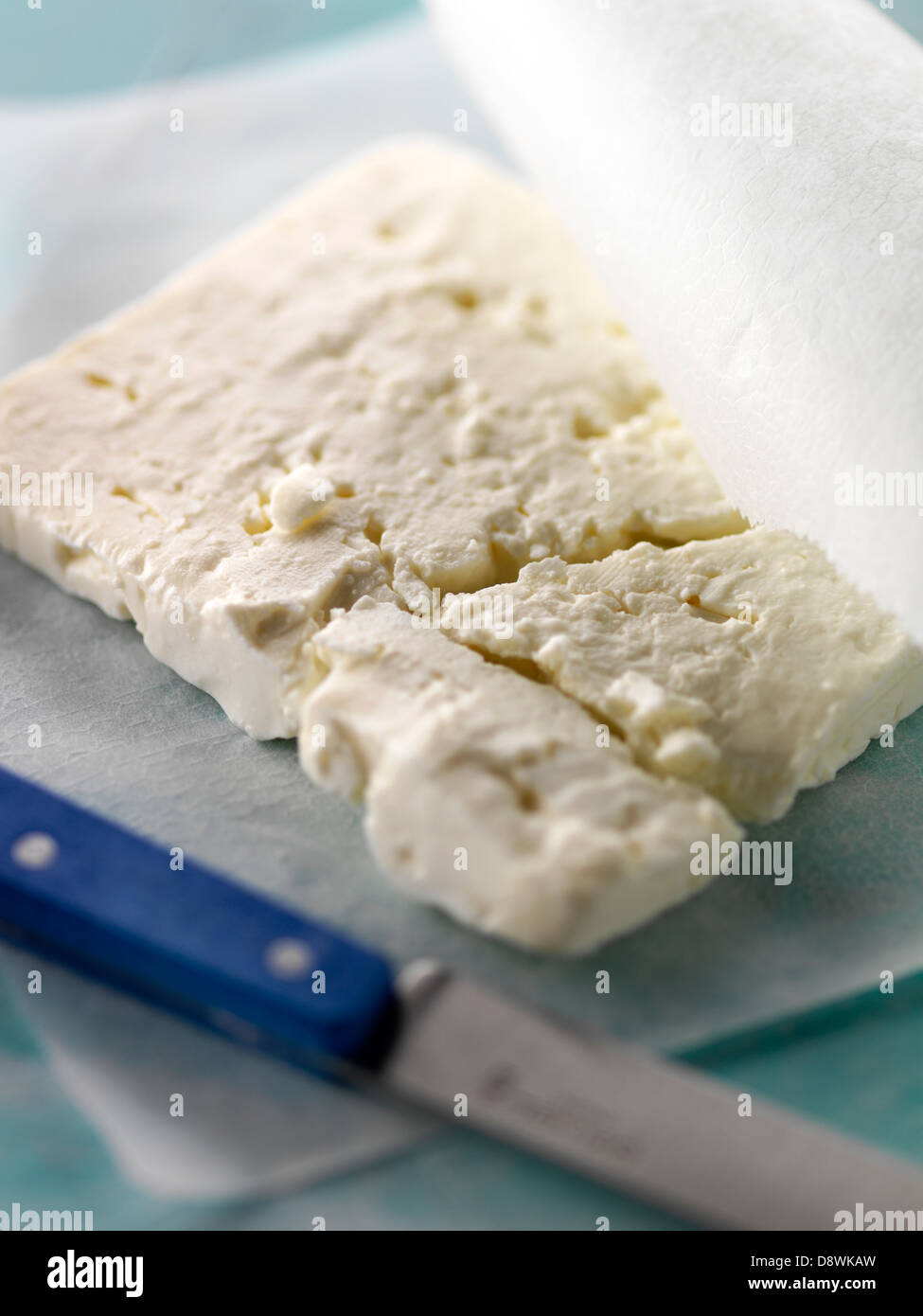 Large slice of feta Stock Photo - Alamy