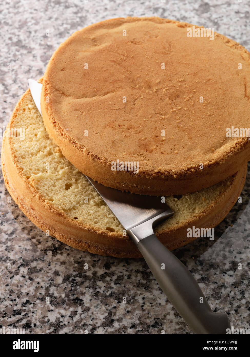 Cutting sponge cake hi-res stock photography and images - Alamy