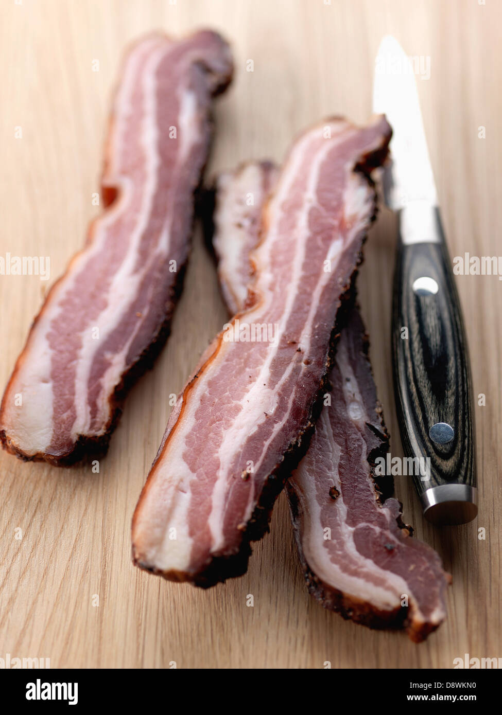 Thick strips of streaky bacon Stock Photo - Alamy