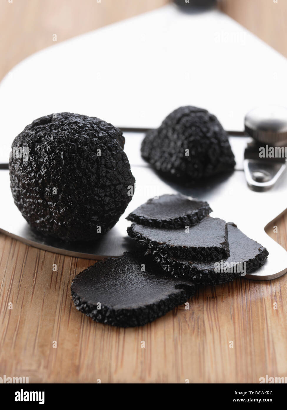 Slicing a black truffle Stock Photo - Alamy