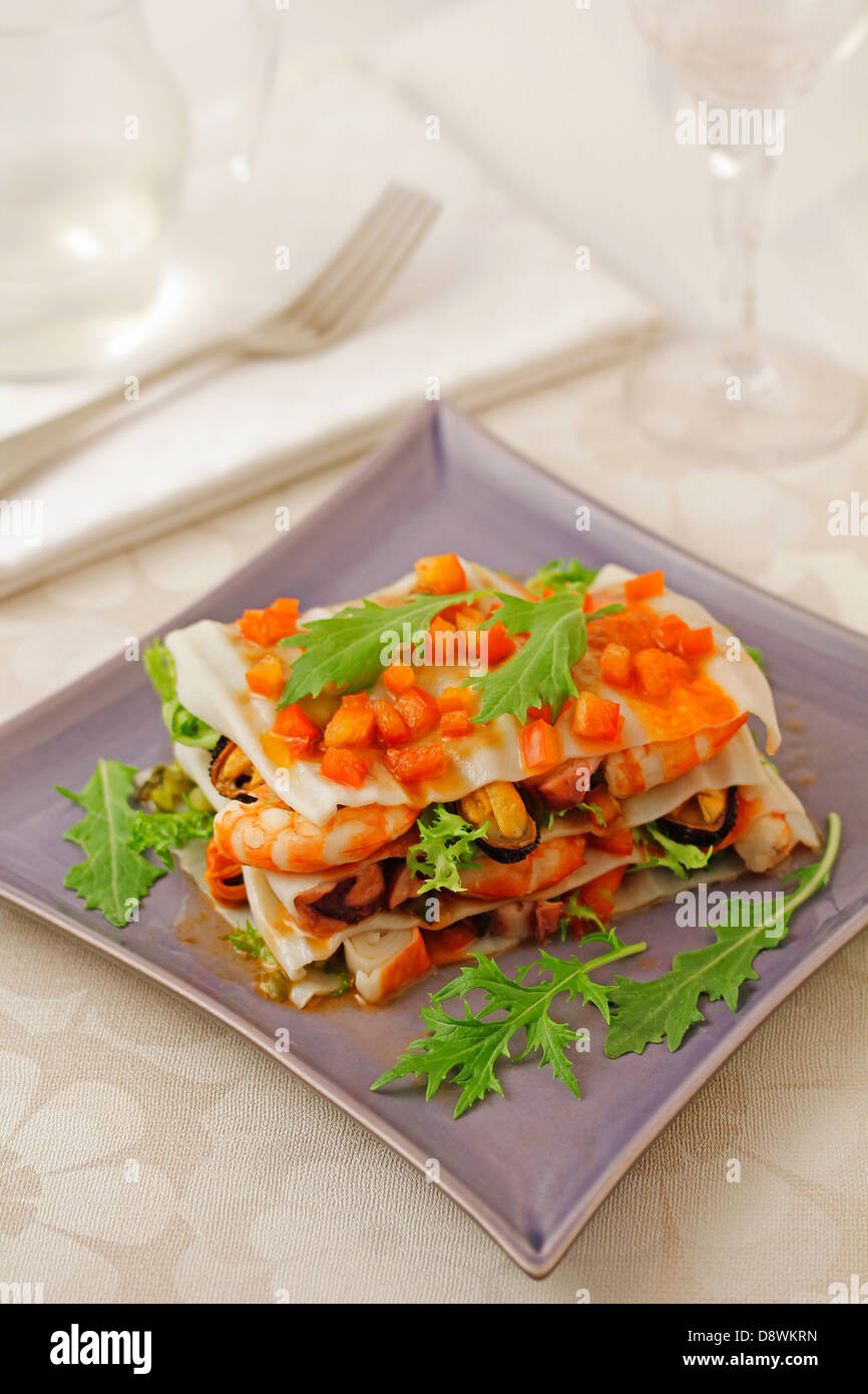Cold lasagna with shellfish. Recipe available Stock Photo - Alamy