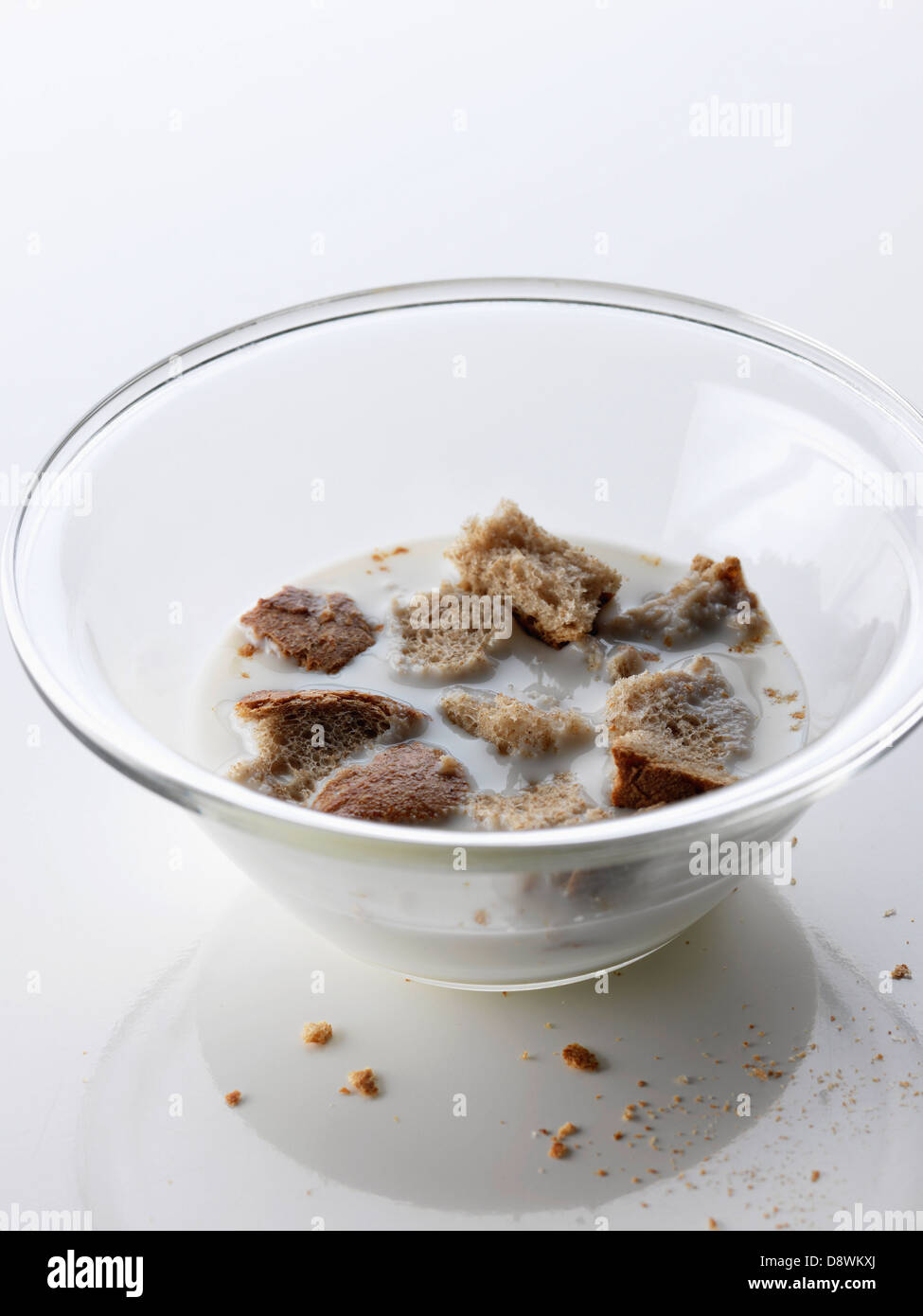 Soaking bread in milk Stock Photo - Alamy