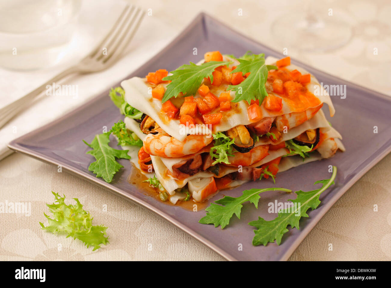 Cold lasagna with shellfish. Recipe available Stock Photo - Alamy