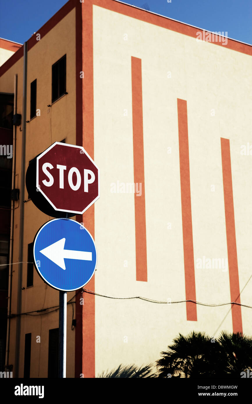 Stop sign with arrow sign Stock Photo - Alamy