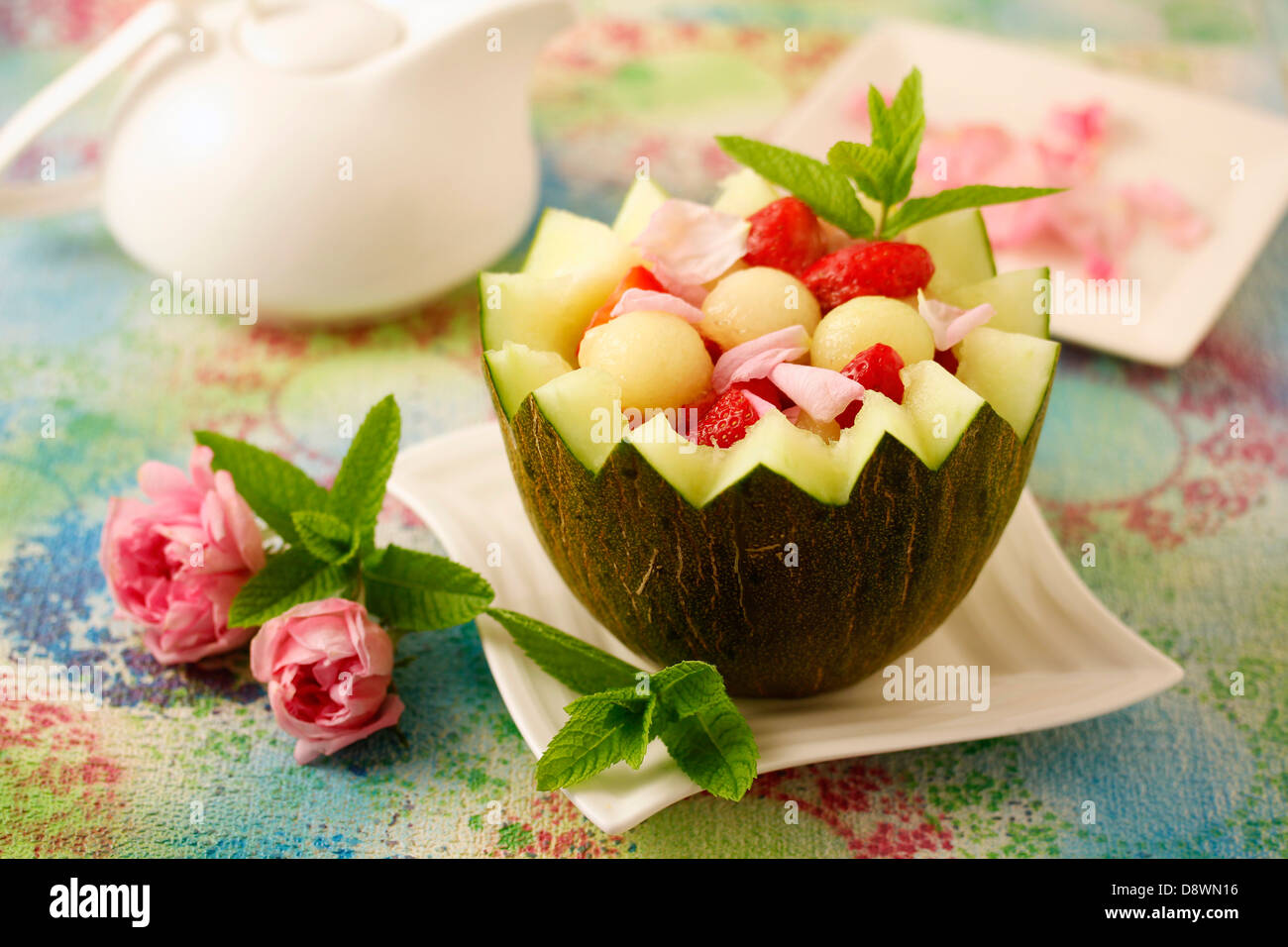 Stuffed melon with roses flavour. Recipe available Stock Photo - Alamy