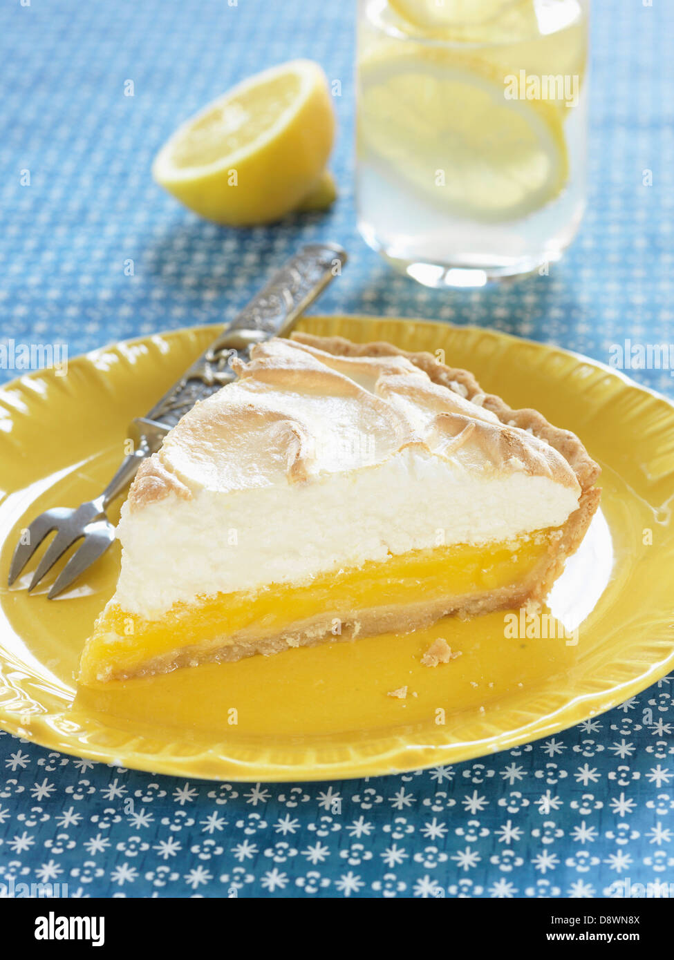 Slice of lemon meringue pie Stock Photo - Alamy