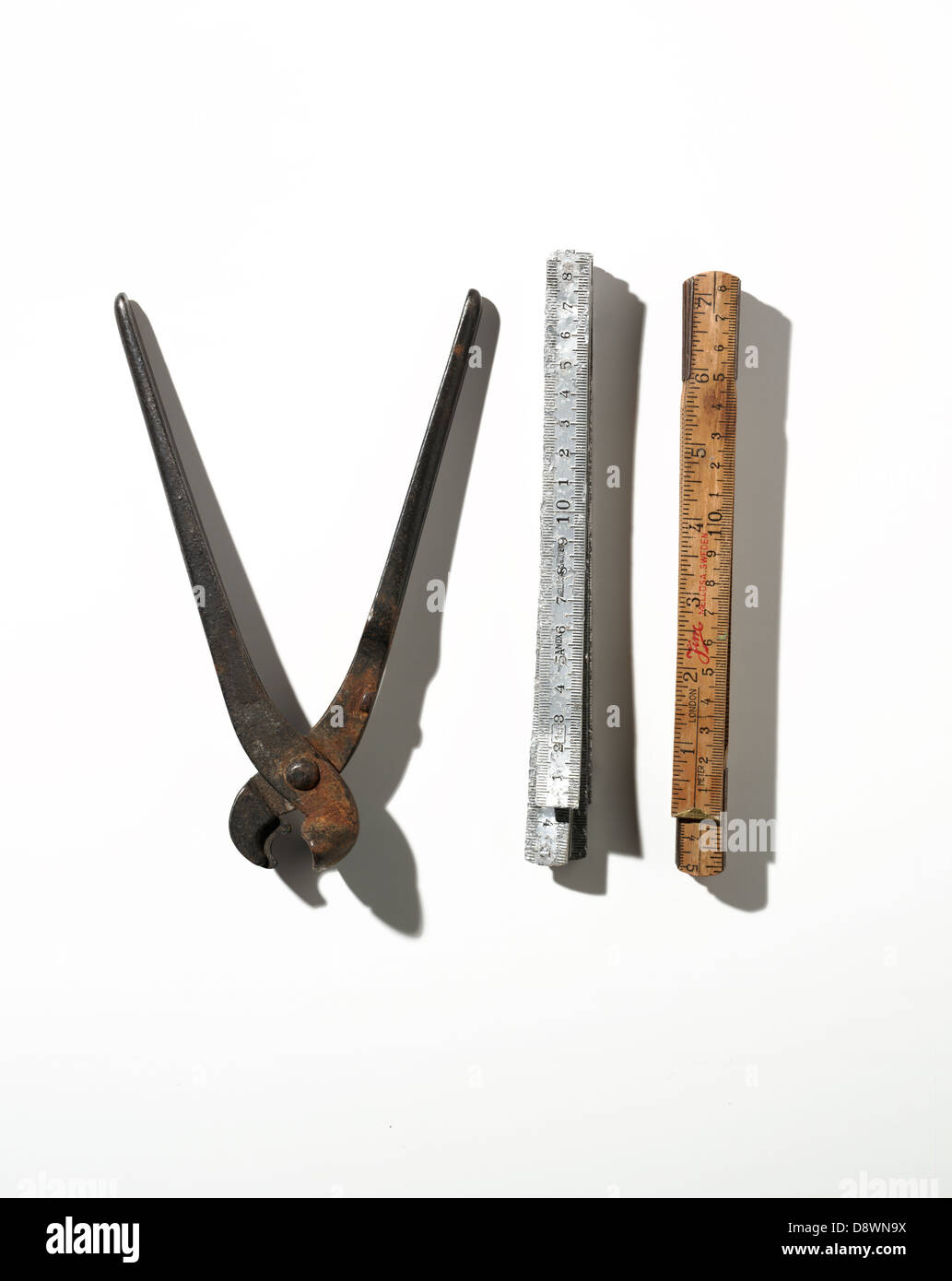 Measures and tongs, close-up Stock Photo - Alamy