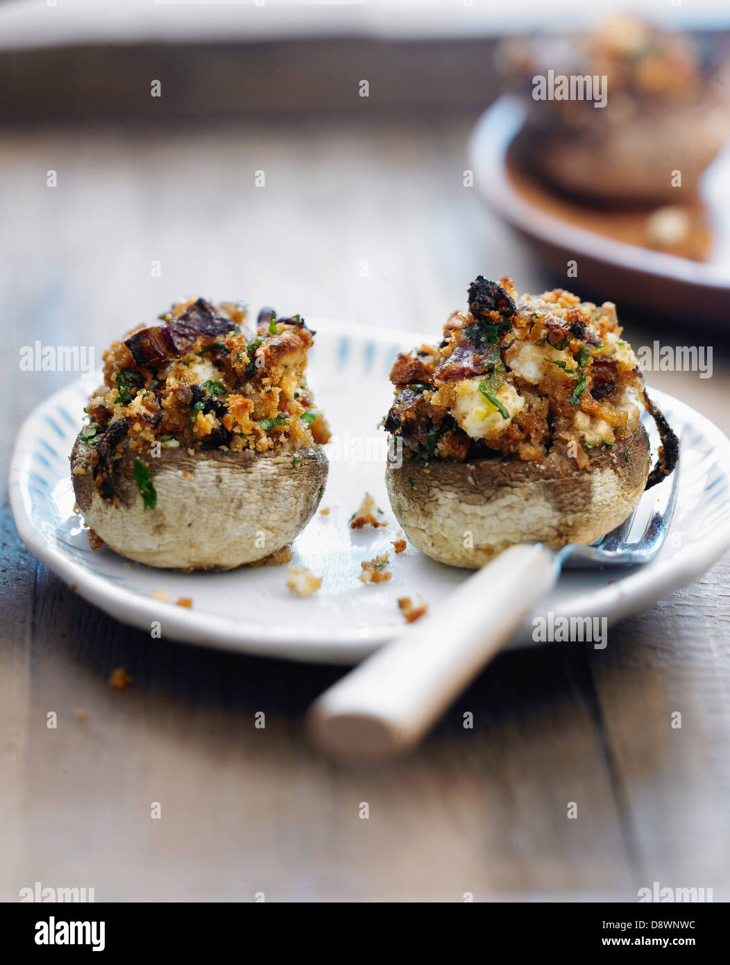 Crisp stuffed button mushroom tops Stock Photo - Alamy