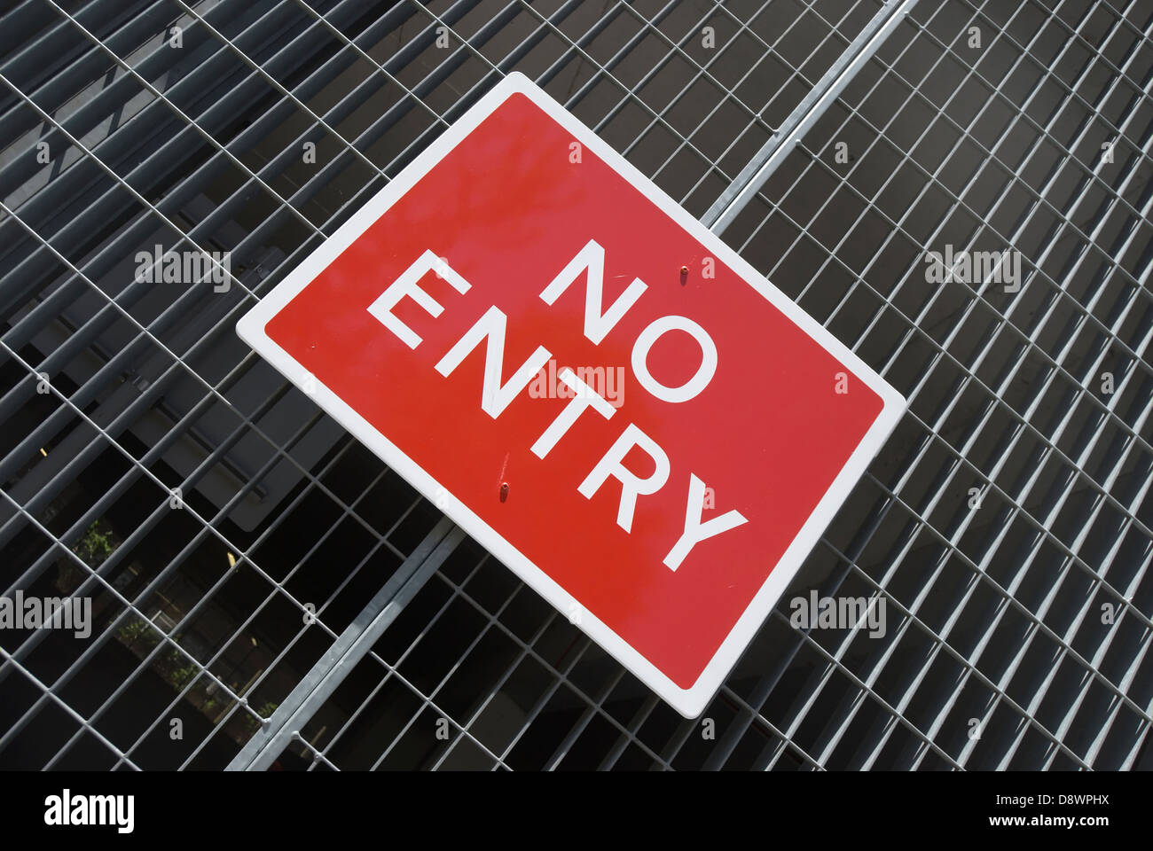british no entry sign, fixed to a iron grille fence Stock Photo - Alamy