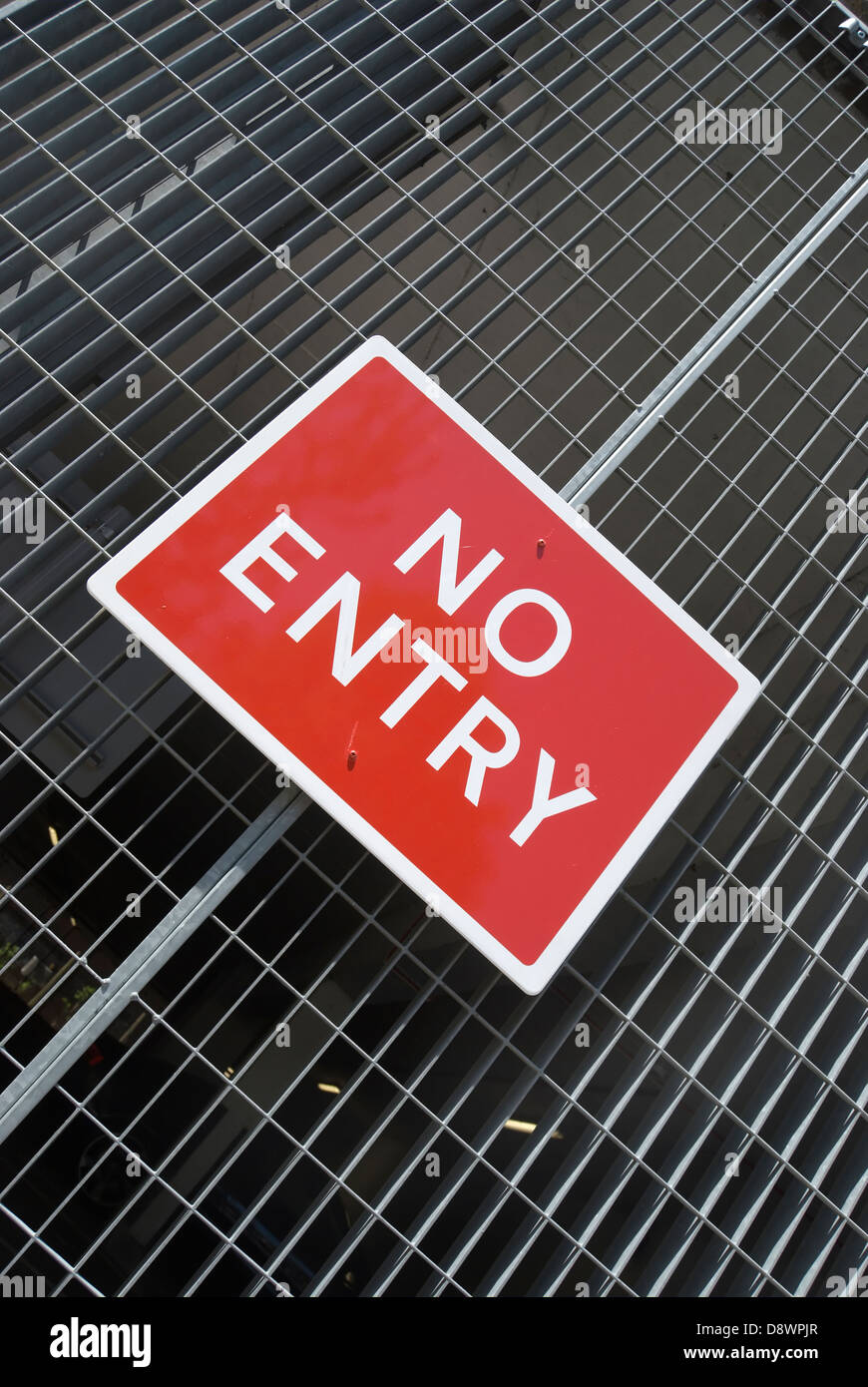 british no entry sign, fixed to a iron grille fence Stock Photo - Alamy