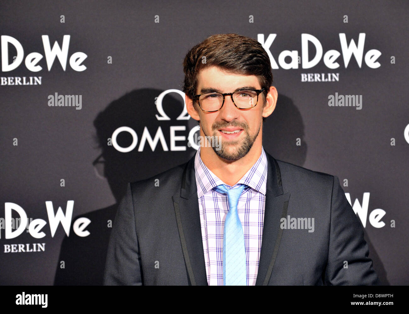 The former swimmer Michael Phelps poses at an exhibition opening of the ...