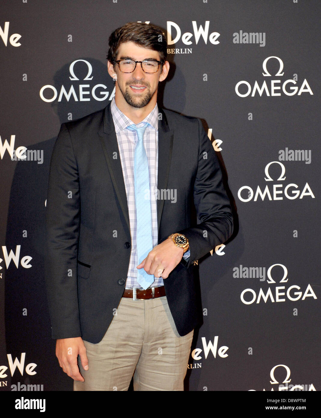 The former swimmer Michael Phelps poses at an exhibition opening of the ...