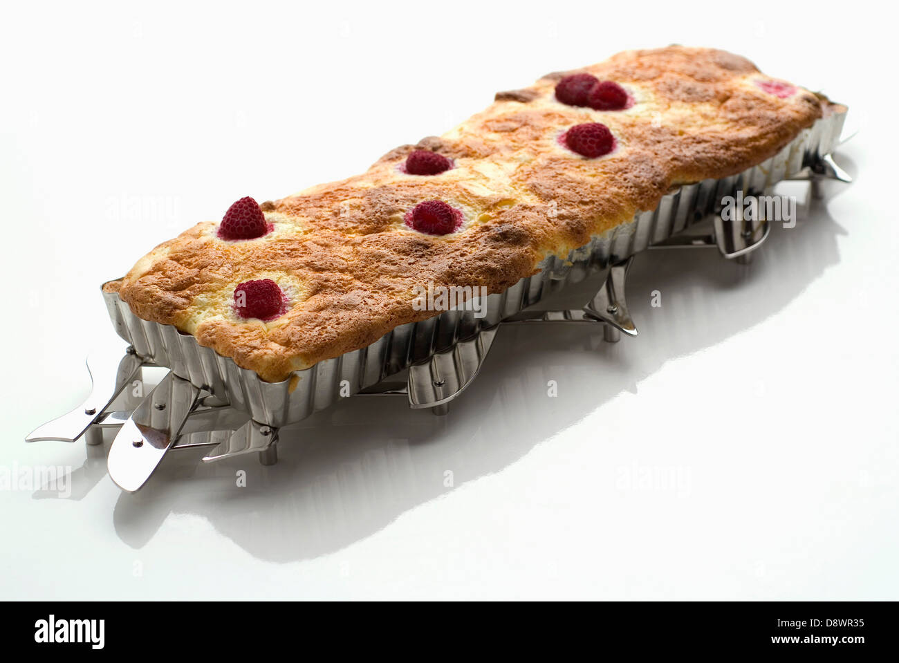 Strawberry and raspberry fromage blanc tart soufflé Stock Photo - Alamy