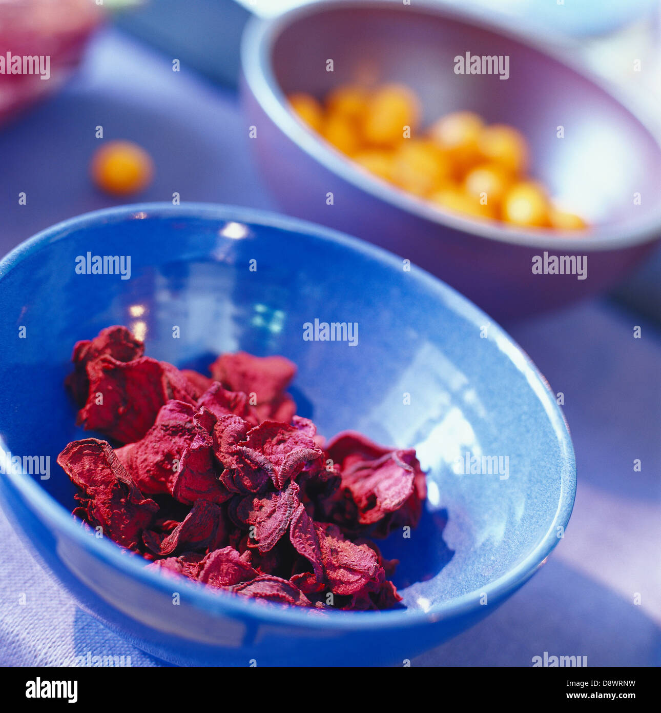 Close-up on blue ceramic bowls with colourful contents Stock Photo - Alamy