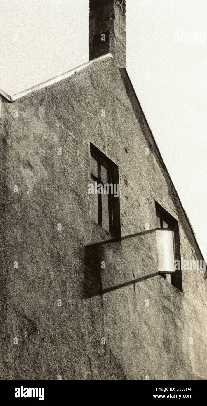 Exterior of grey building Stock Photo - Alamy