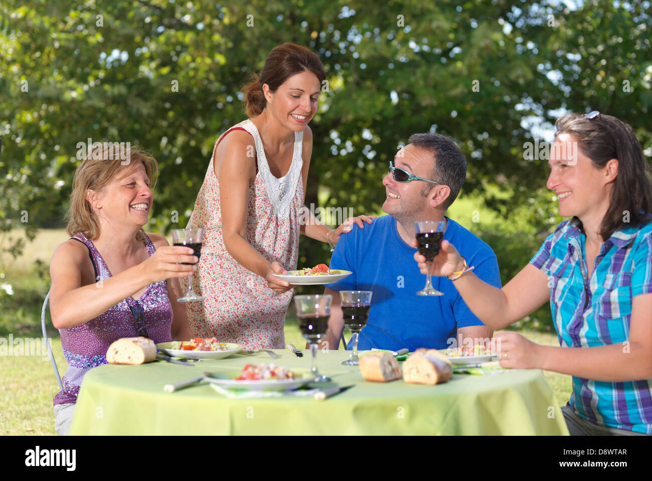 People having lunch outdoors Stock Photo - Alamy