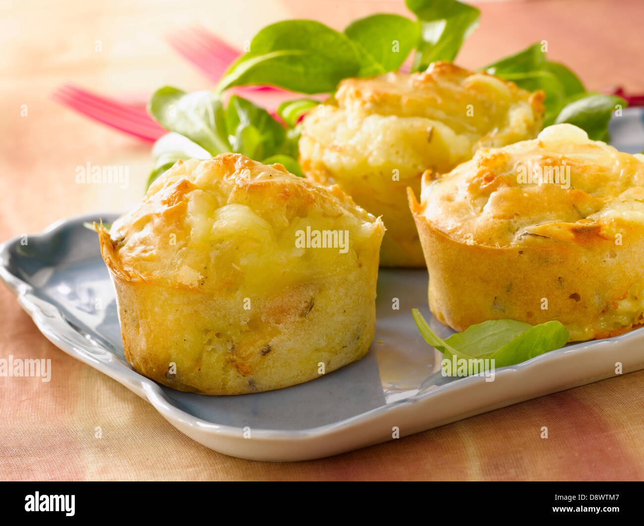 Chicken and cheese individual savoury cakes Stock Photo - Alamy