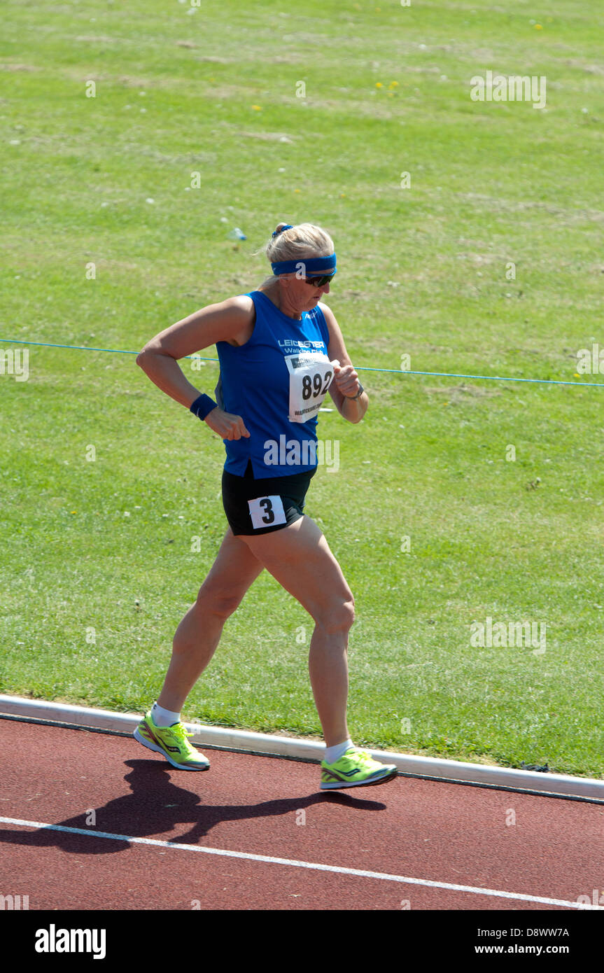 Race walking, woman athlete Stock Photo - Alamy