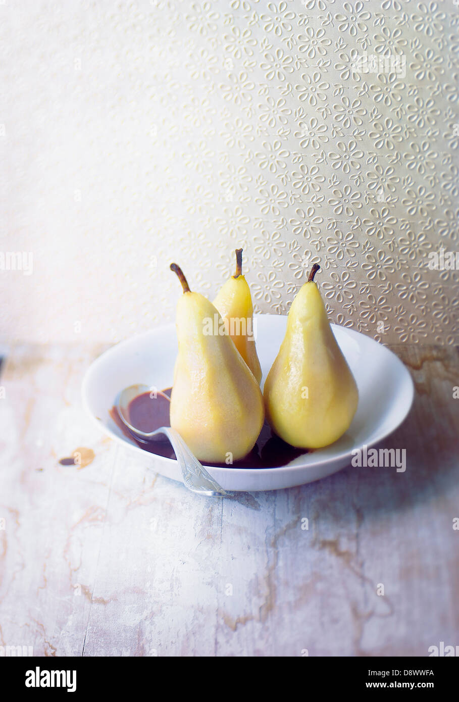 Poached pear chocolate sauce hi-res stock photography and images - Alamy