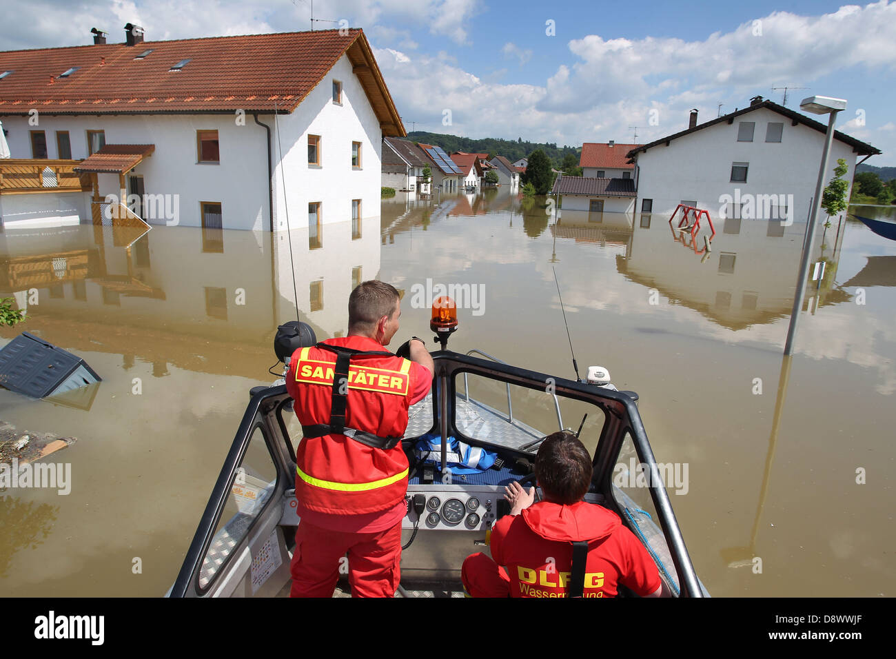 Helpers of the DLRG, the German Life Saving Association, patrol through ...