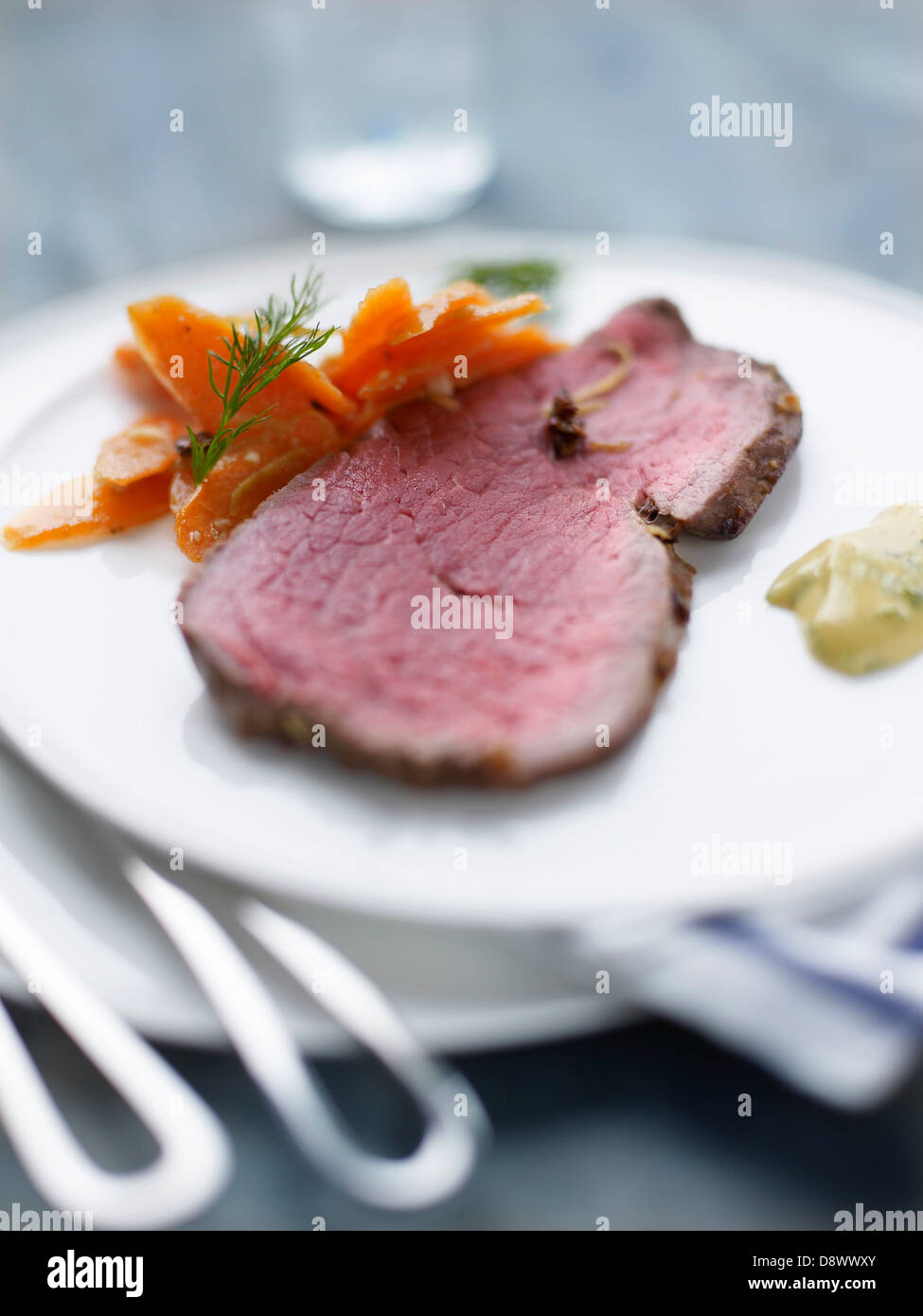 Slice of roast beef with carrots ,tarragon and mustard sauce Stock ...
