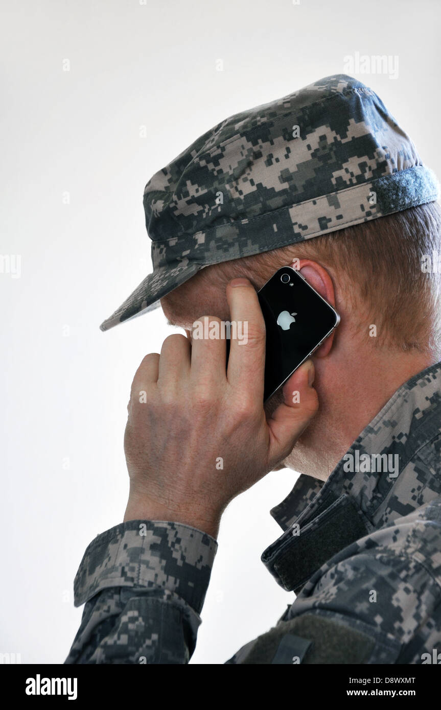 Soldier with iPhone making phone call Stock Photo - Alamy