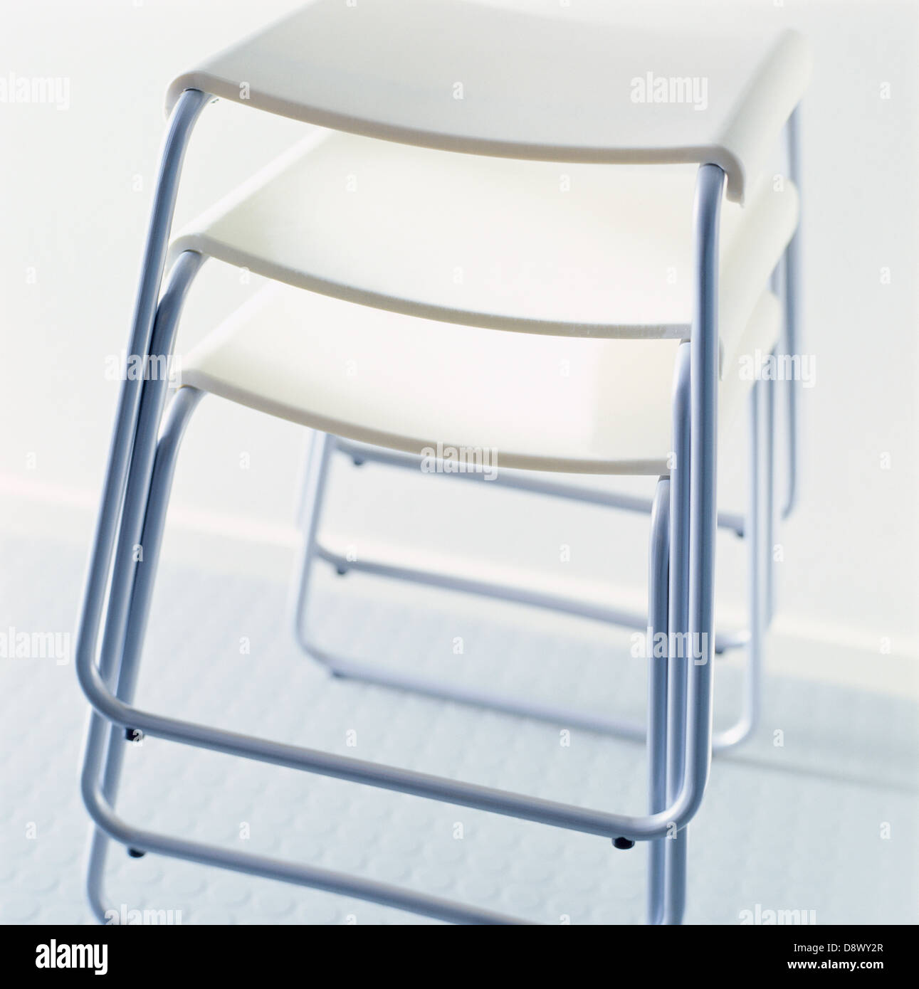 Pile of stools Stock Photo - Alamy