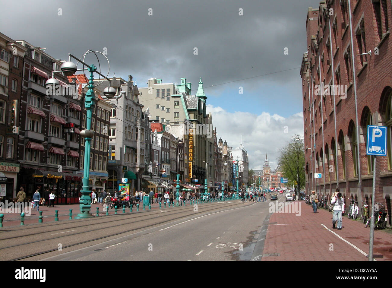 A city road in Amsterdam, Netherlands, showcases the characteristic ...