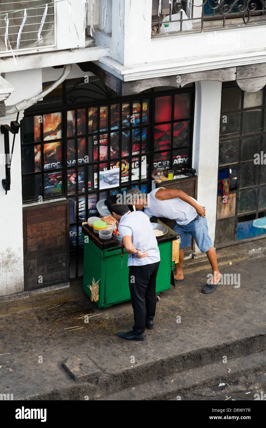 Everyday Life in the Streets of Manila, Philippines Stock Photo - Alamy