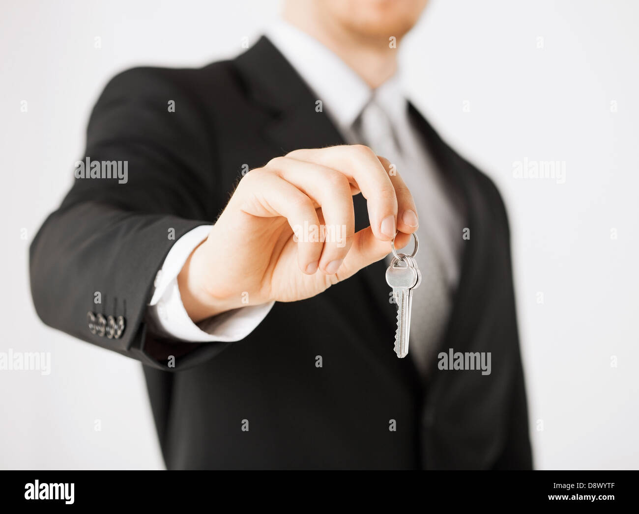 man holding house keys Stock Photo - Alamy