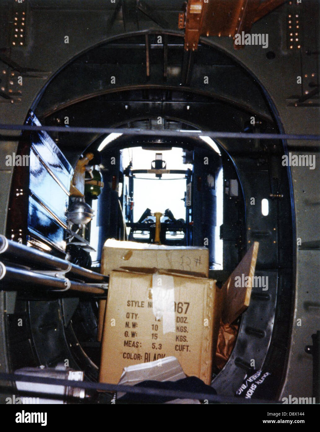 The interior of the Consolidated B-24J bomber is shown, providing a ...