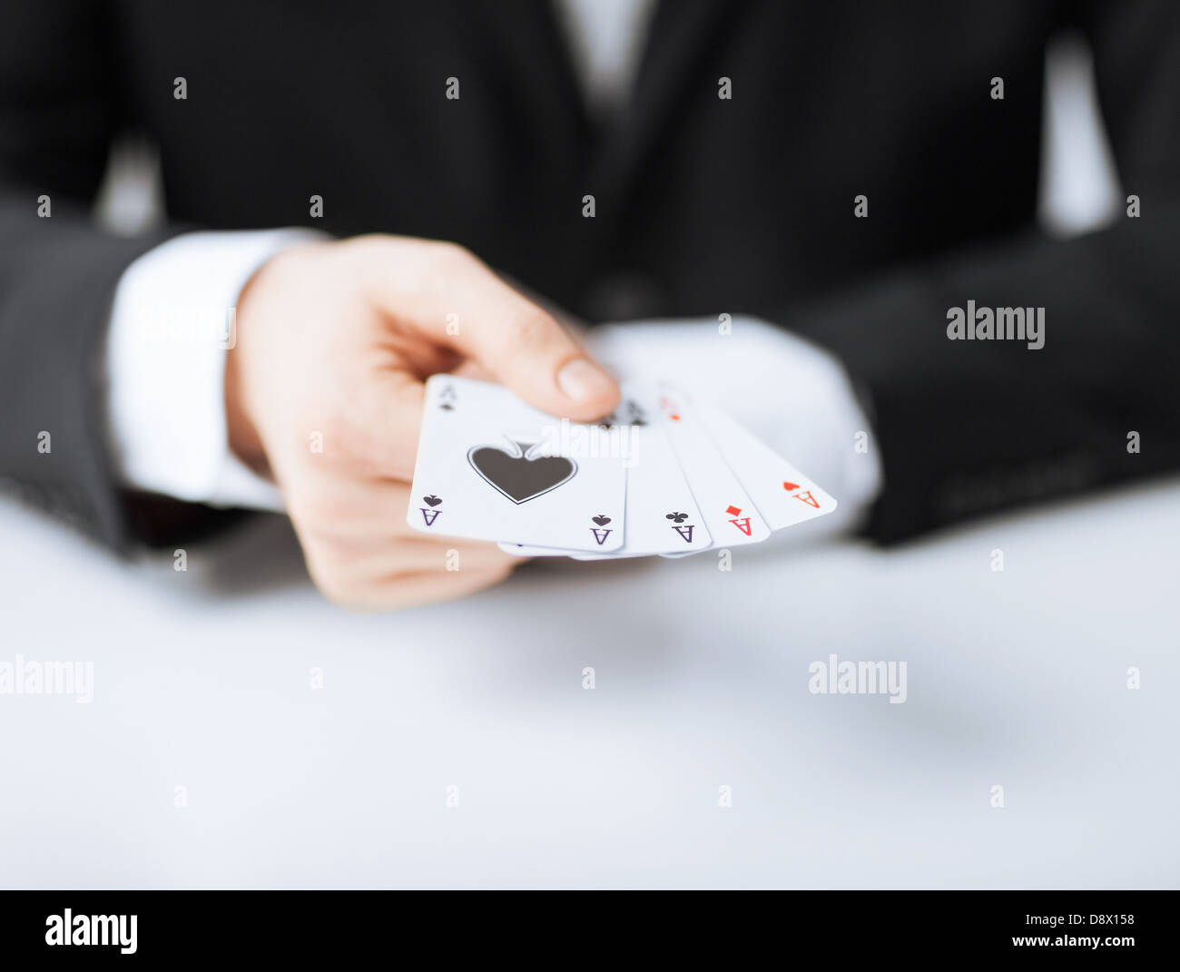 man hand showing four aces Stock Photo - Alamy