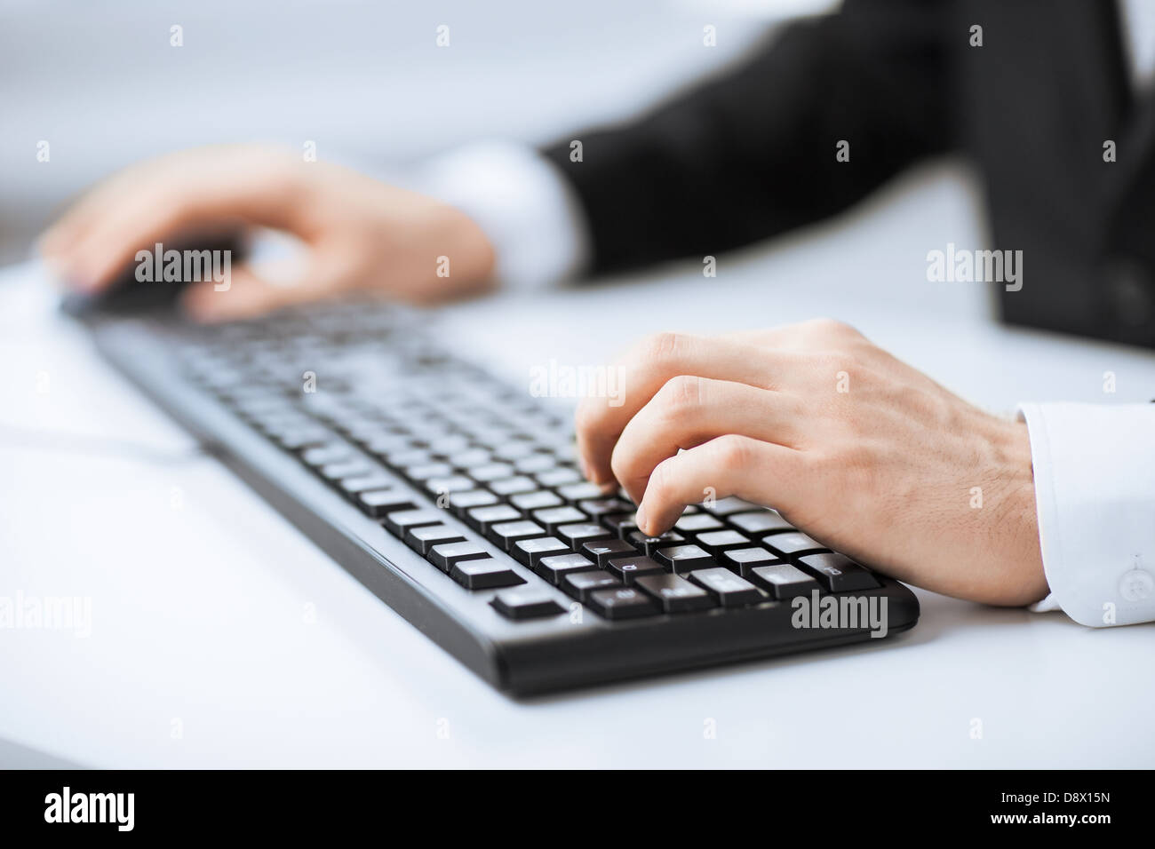 man hands typing on keyboard Stock Photo - Alamy