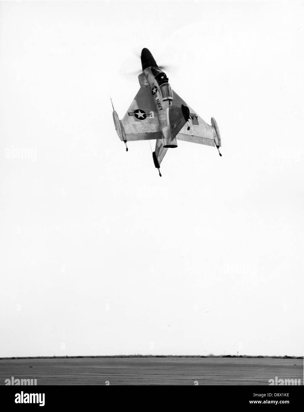 Photograph of the Convair XFY-1, a unique tail-sitter aircraft designed ...
