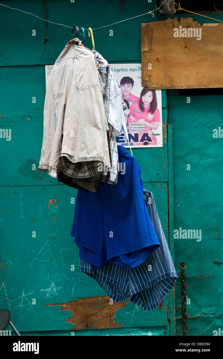 Laundry hung out to dry in Manila, Philippines Stock Photo - Alamy