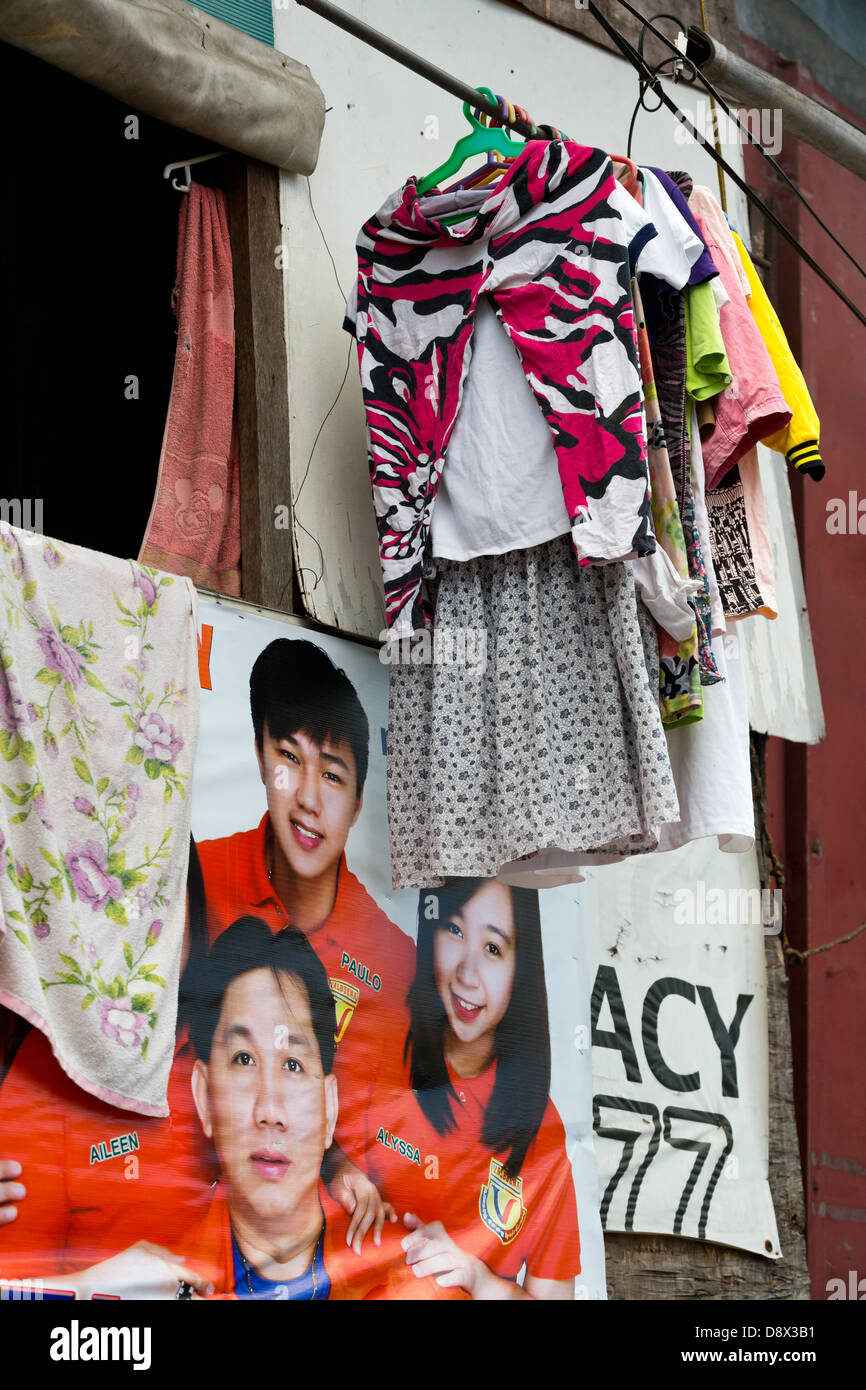 Laundry hung out to dry in Manila, Philippines Stock Photo - Alamy