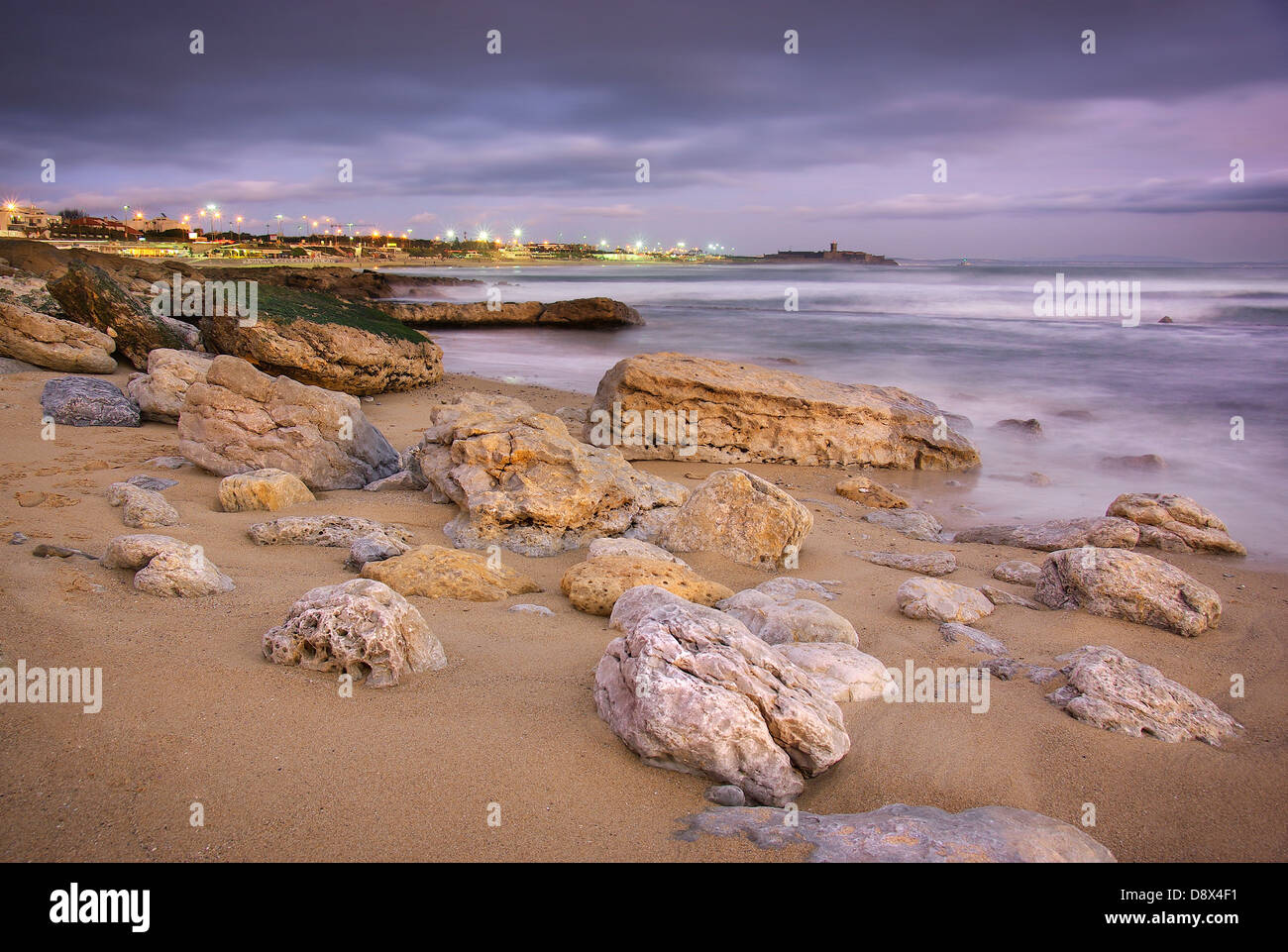Golden ocean waves sunset carcavelos hi-res stock photography and ...