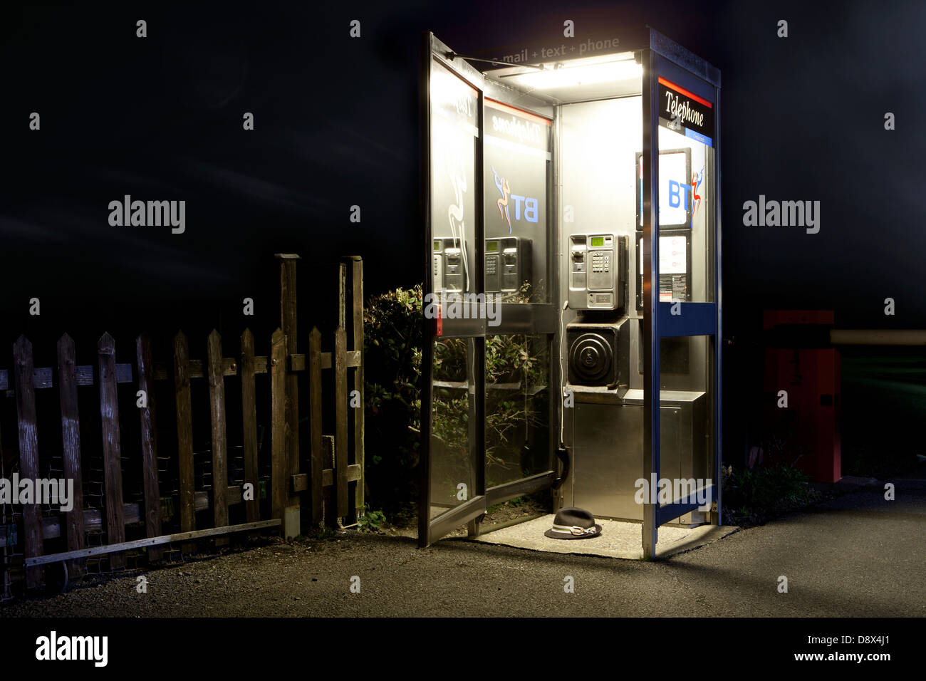 Image from Arcanum series showing phone box at night with phone off the ...