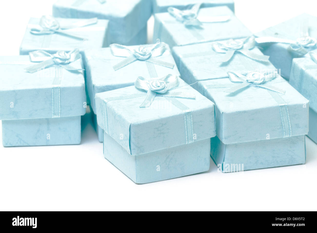 Cyan gift boxes on white background Stock Photo - Alamy