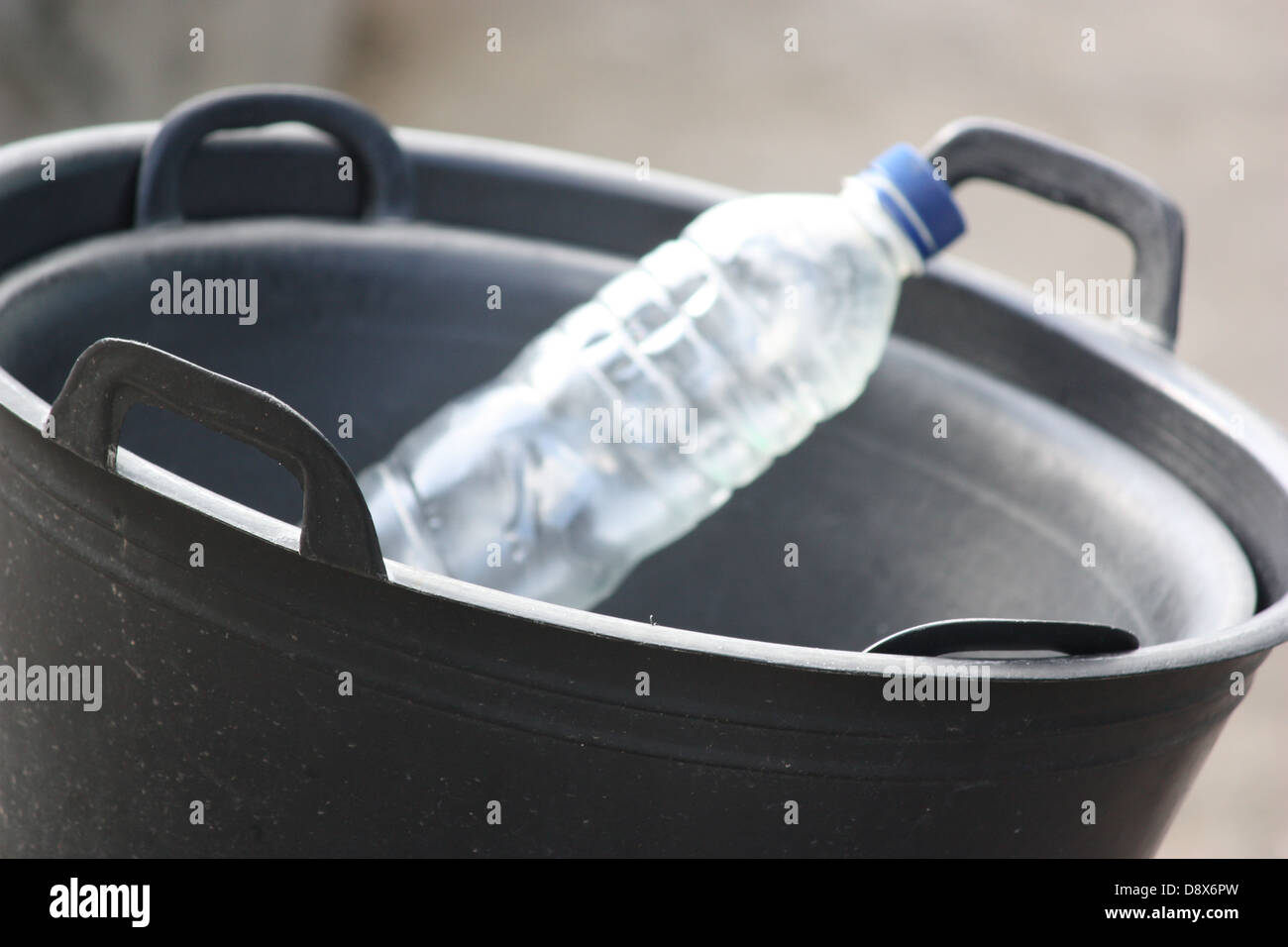 bottle and bucket Stock Photo - Alamy