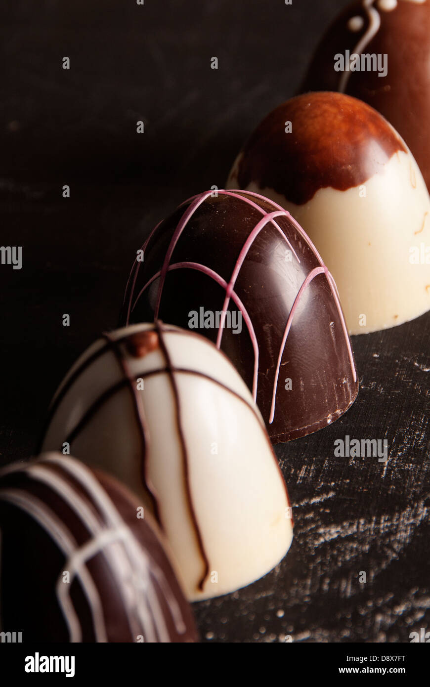 row of sweet chocolate desserts Stock Photo - Alamy