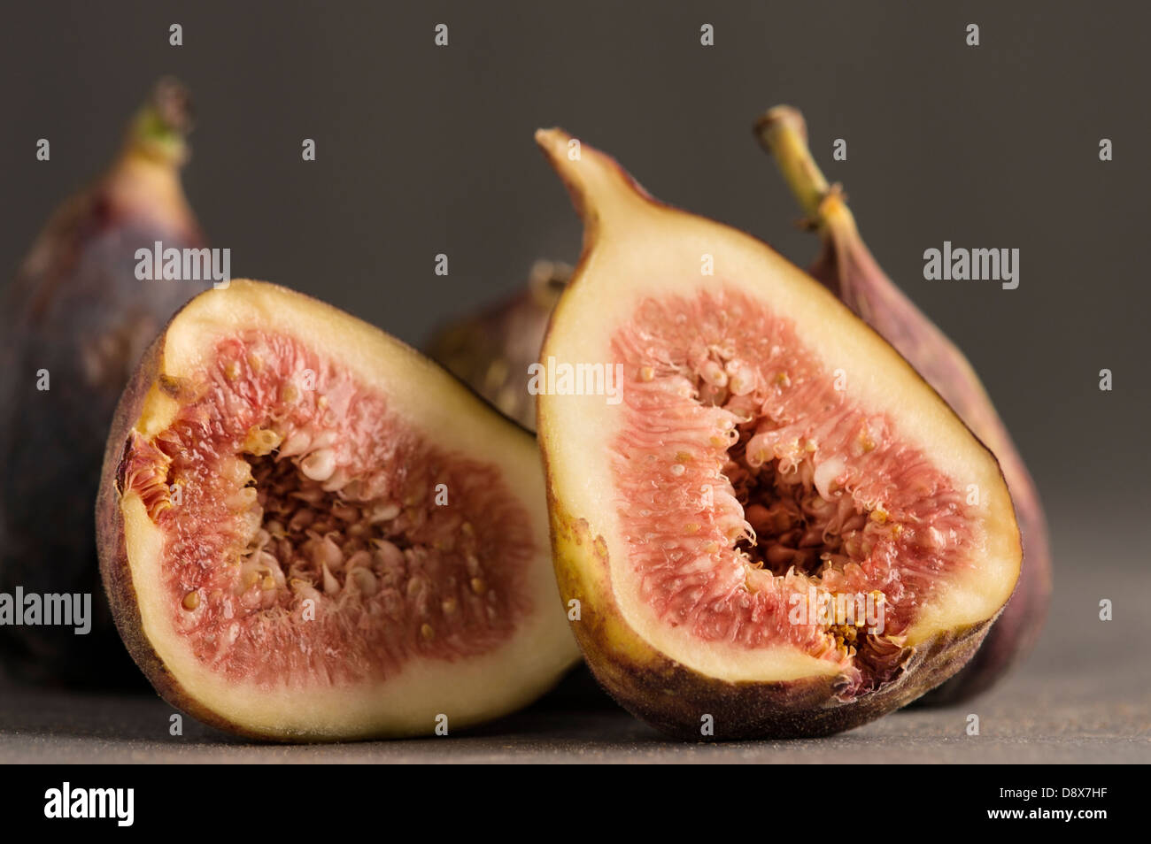 Close-up of a bunch of raw figs sliced open to see the inside Stock ...