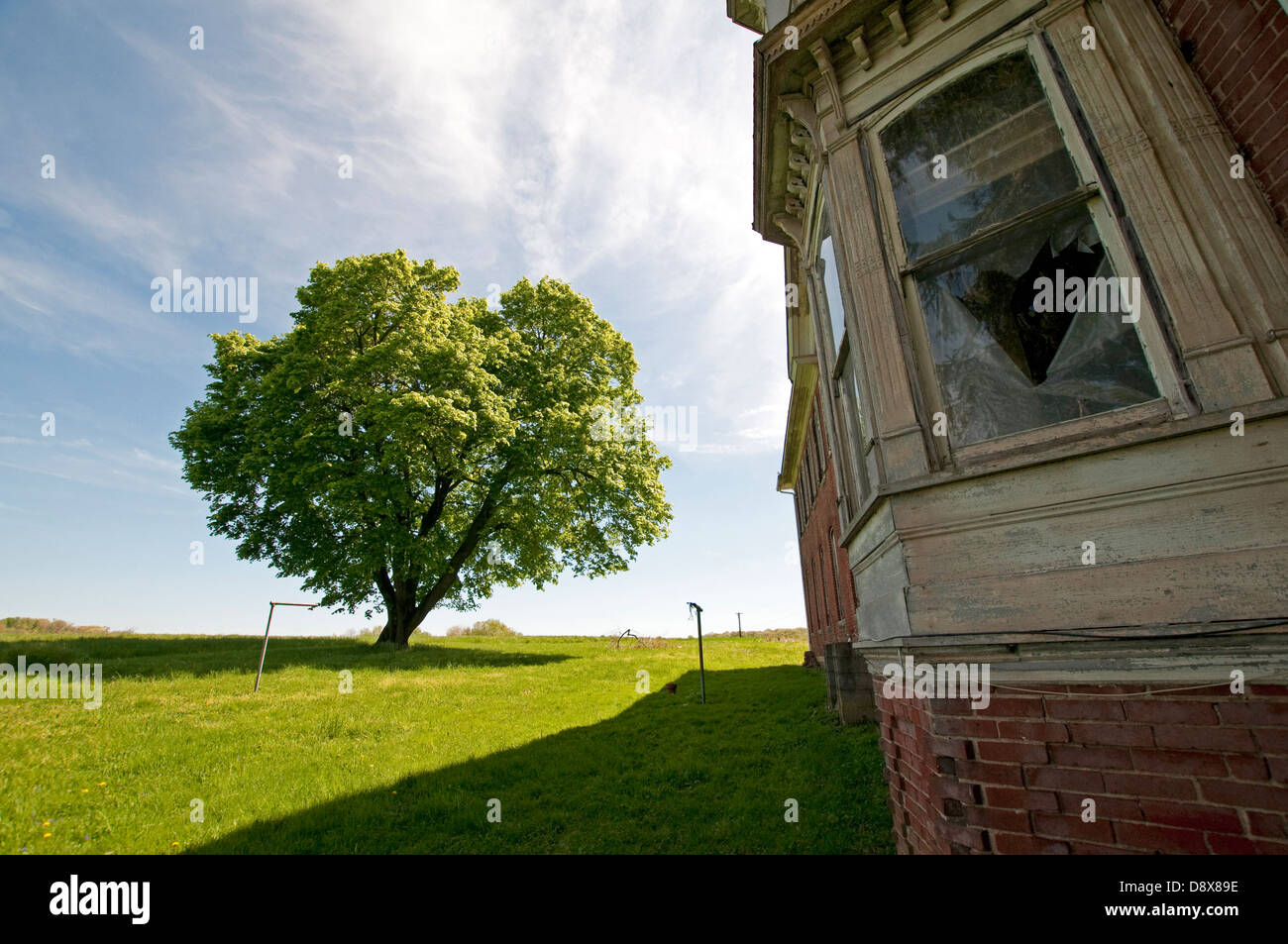 A large detached house, empty and abandoned in rural Carroll County ...